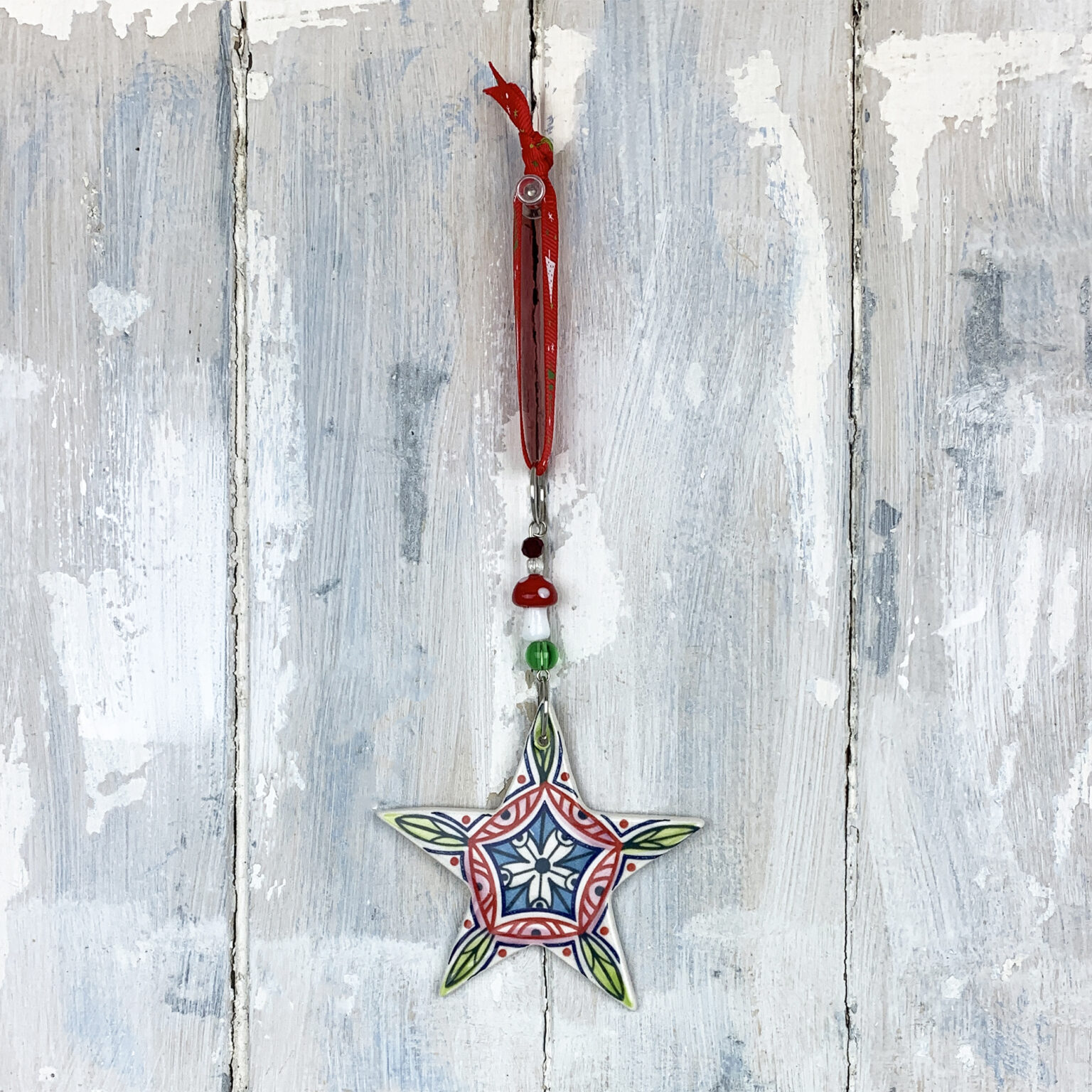 Multi-colour Christmas Star 2026 decoration. Handmade in the UK